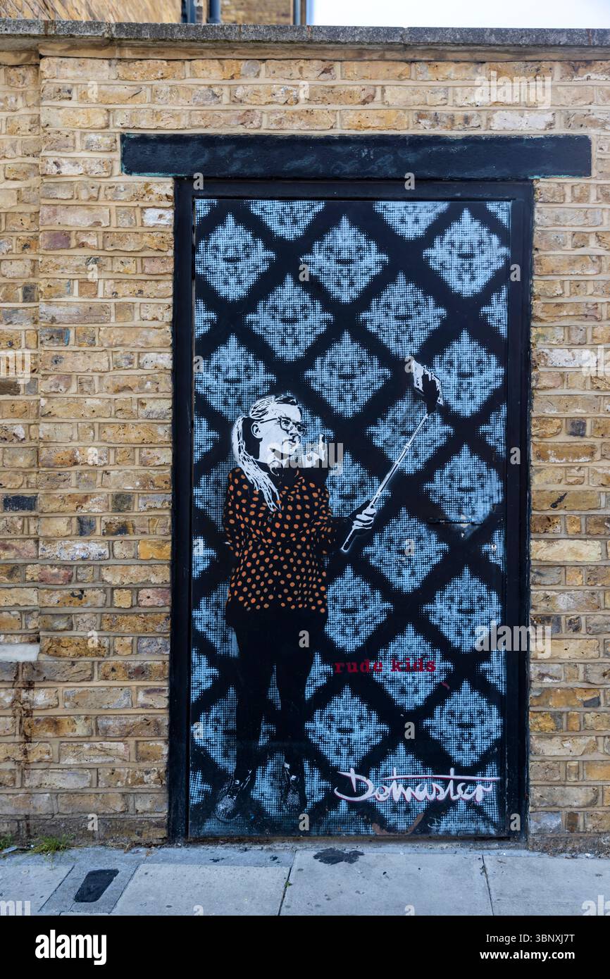London, UK, 11 May 2025, A Black and White Graffiti of a Woman Taking a ...