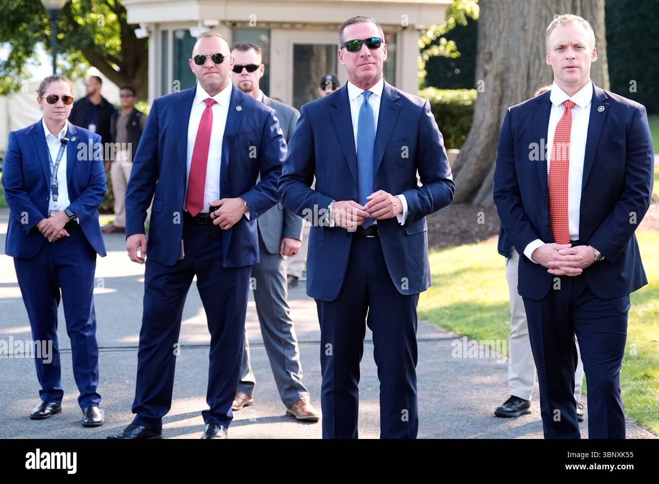 U.S. Secret Service Director Sean Curran, second from right, looks on ...