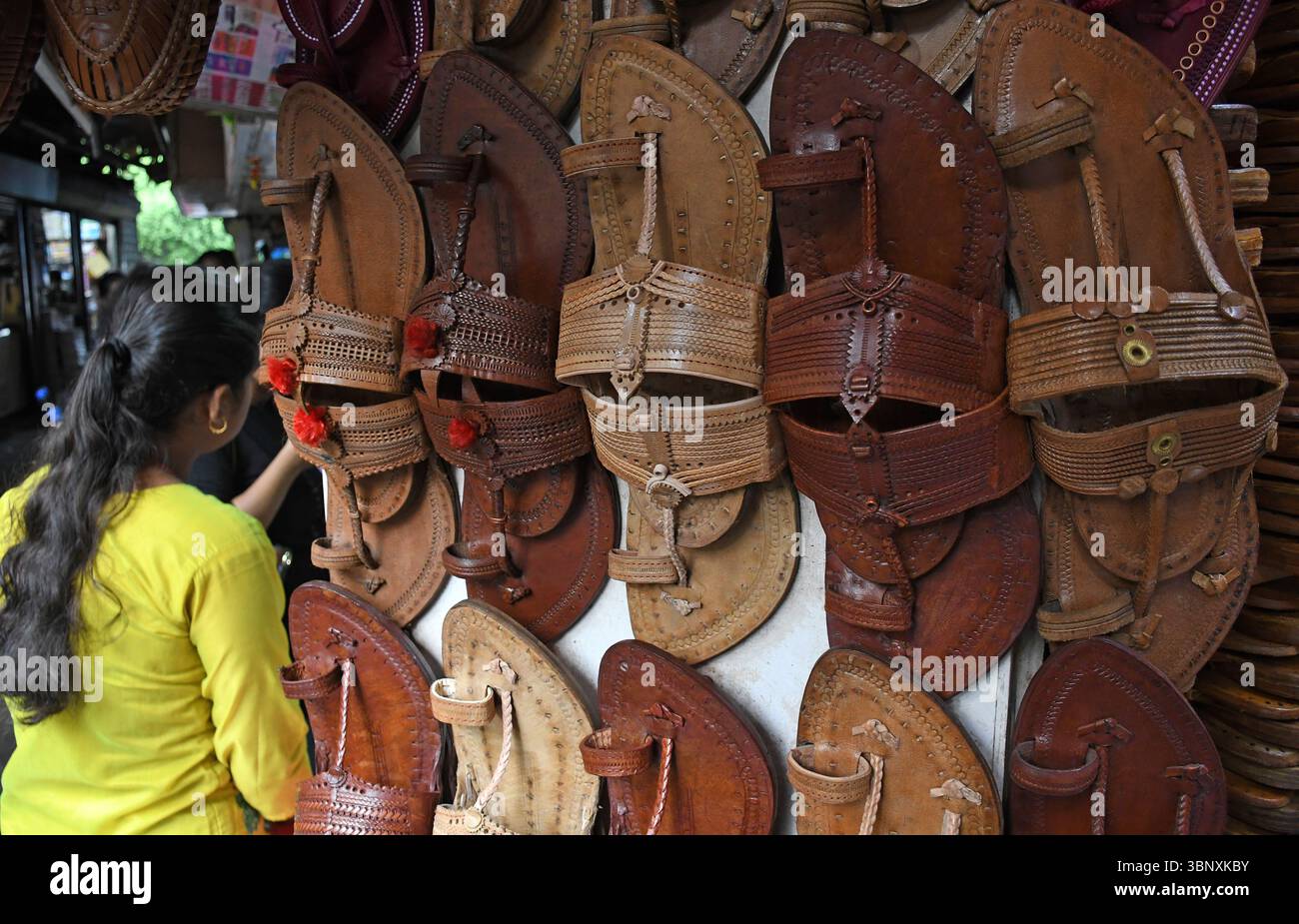 Pairs of kolhapuri chappals hi-res stock photography and images - Alamy
