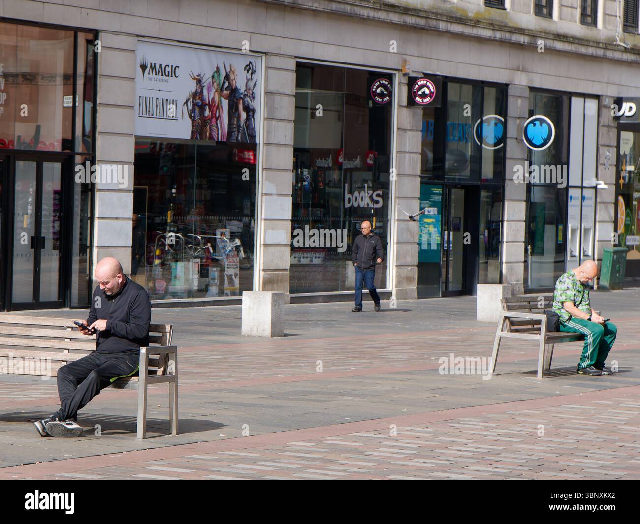 Black man using phones hi-res stock photography and images - Alamy