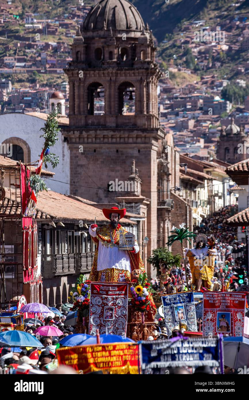 San Jeronimo and San Cristobal floats with La Merced Church bell tower ...