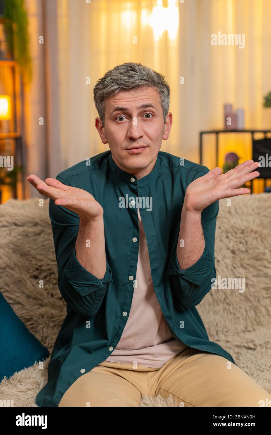 Shocked young man reacts disbelief hi-res stock photography and images ...