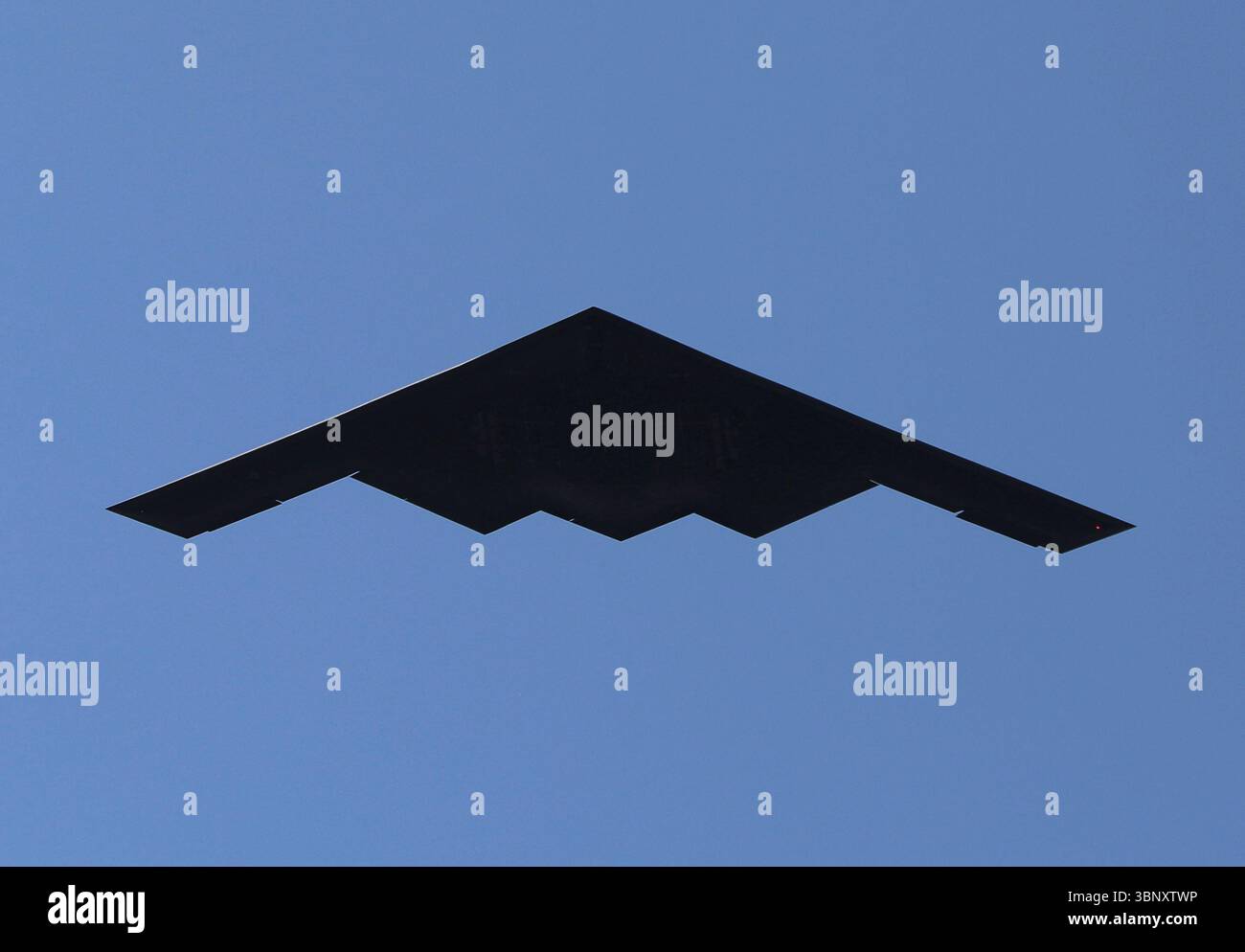 A B-2 bomber conducts a flyover during a Fourth of July celebration at ...