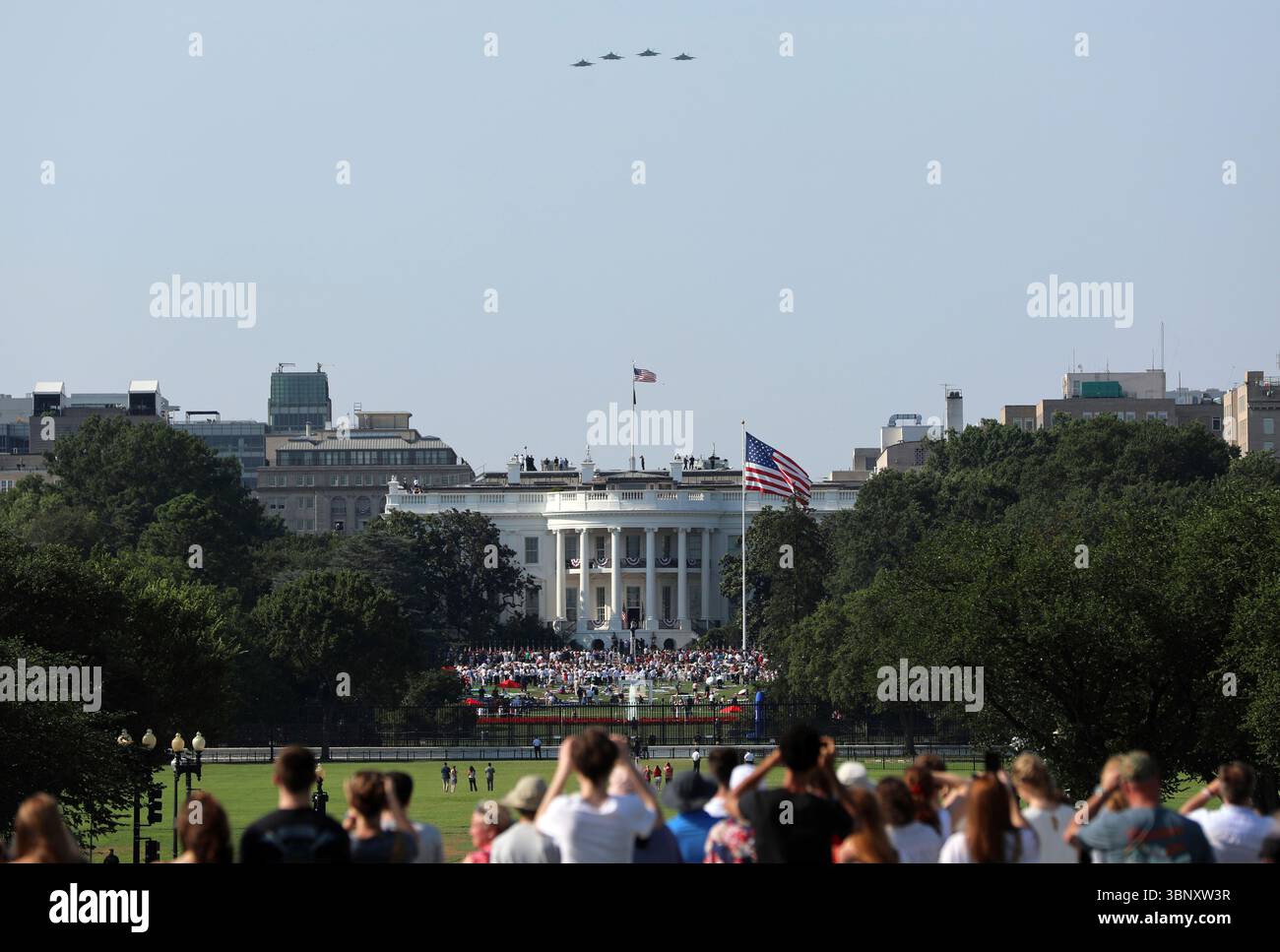 Military aircraft conduct a flyover during a Fourth of July celebration ...