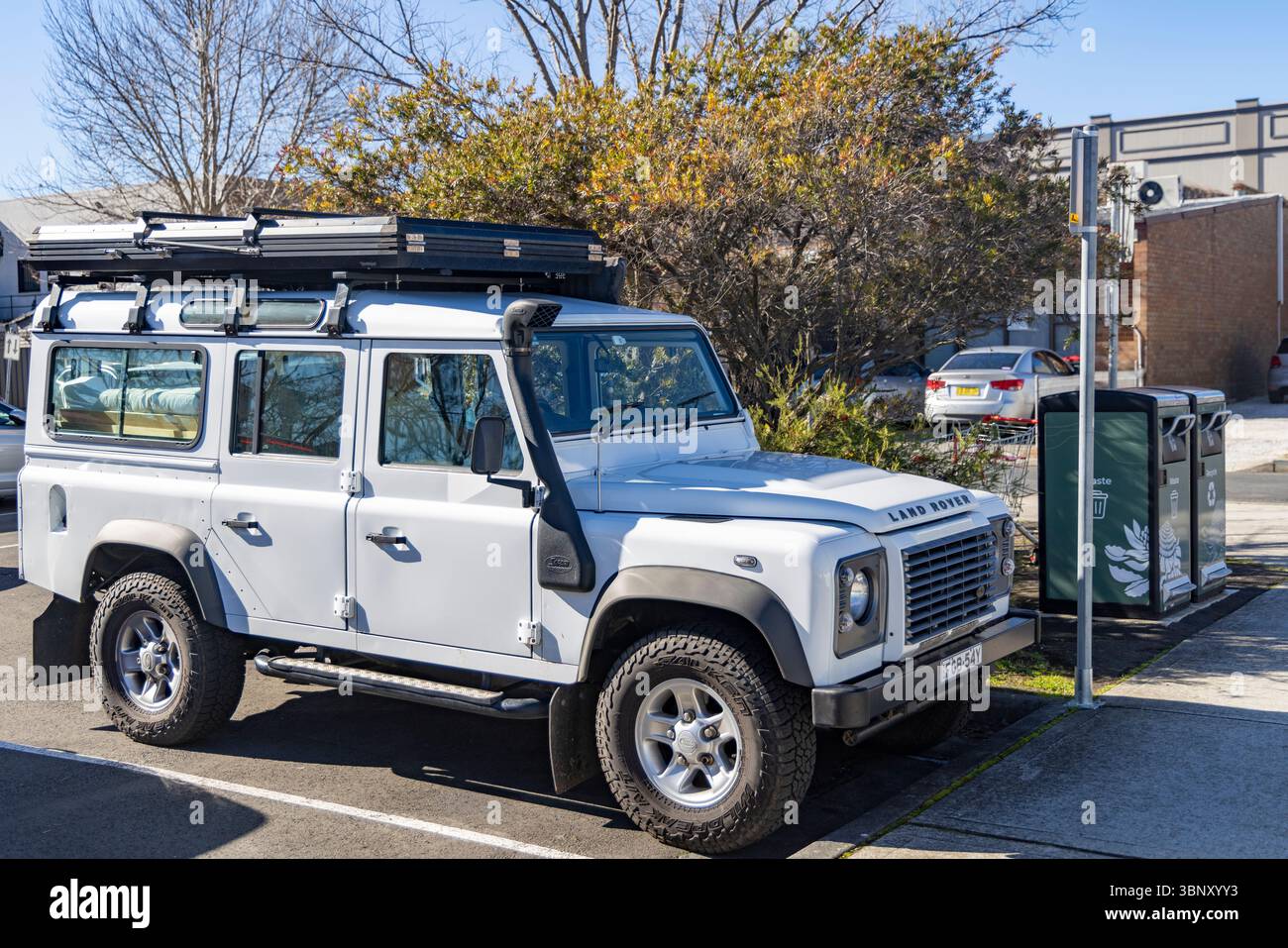 2012 white Land Rover Defender 4WD vehicle parked in Bowral town centre ...
