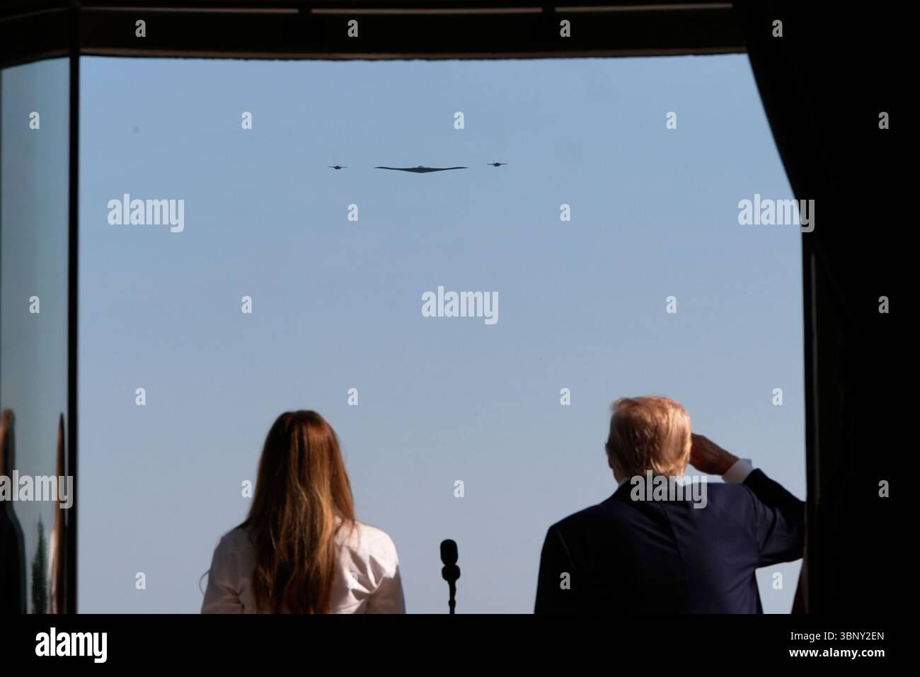 President Donald Trump, right, and first lady Melania Trump observe as ...