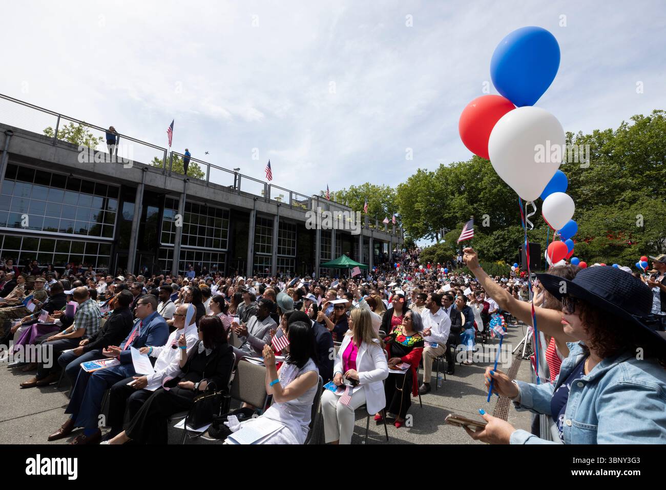 Seattle, Washington, USA. 4th July 2025. Immigrants and spectators ...