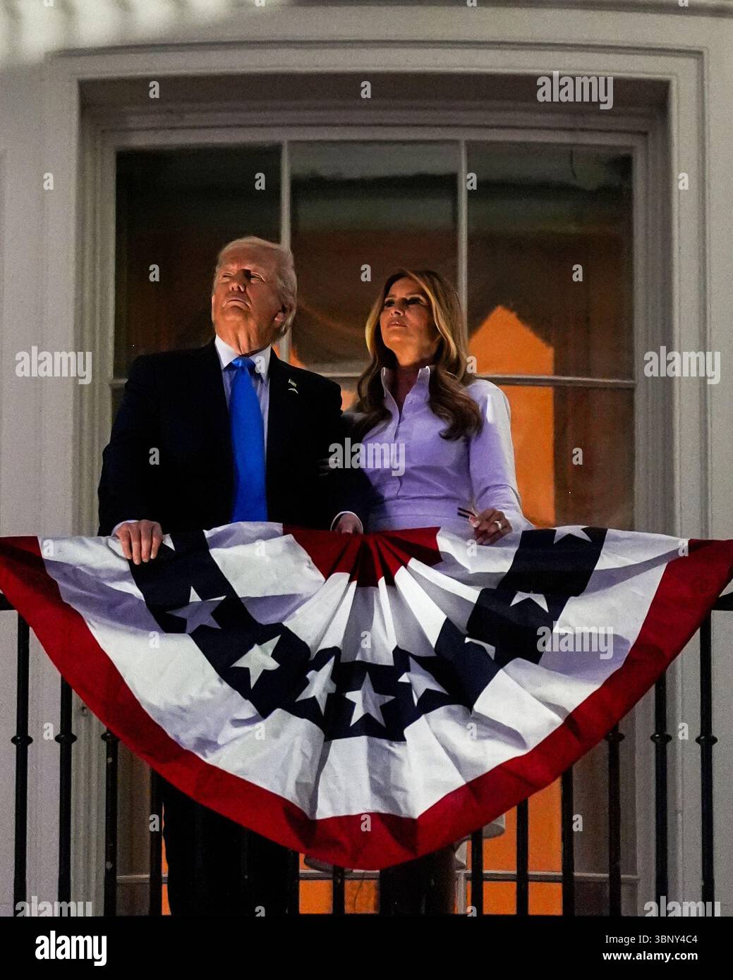 President Donald Trump and first lady Melania Trump watch a Fourth of ...