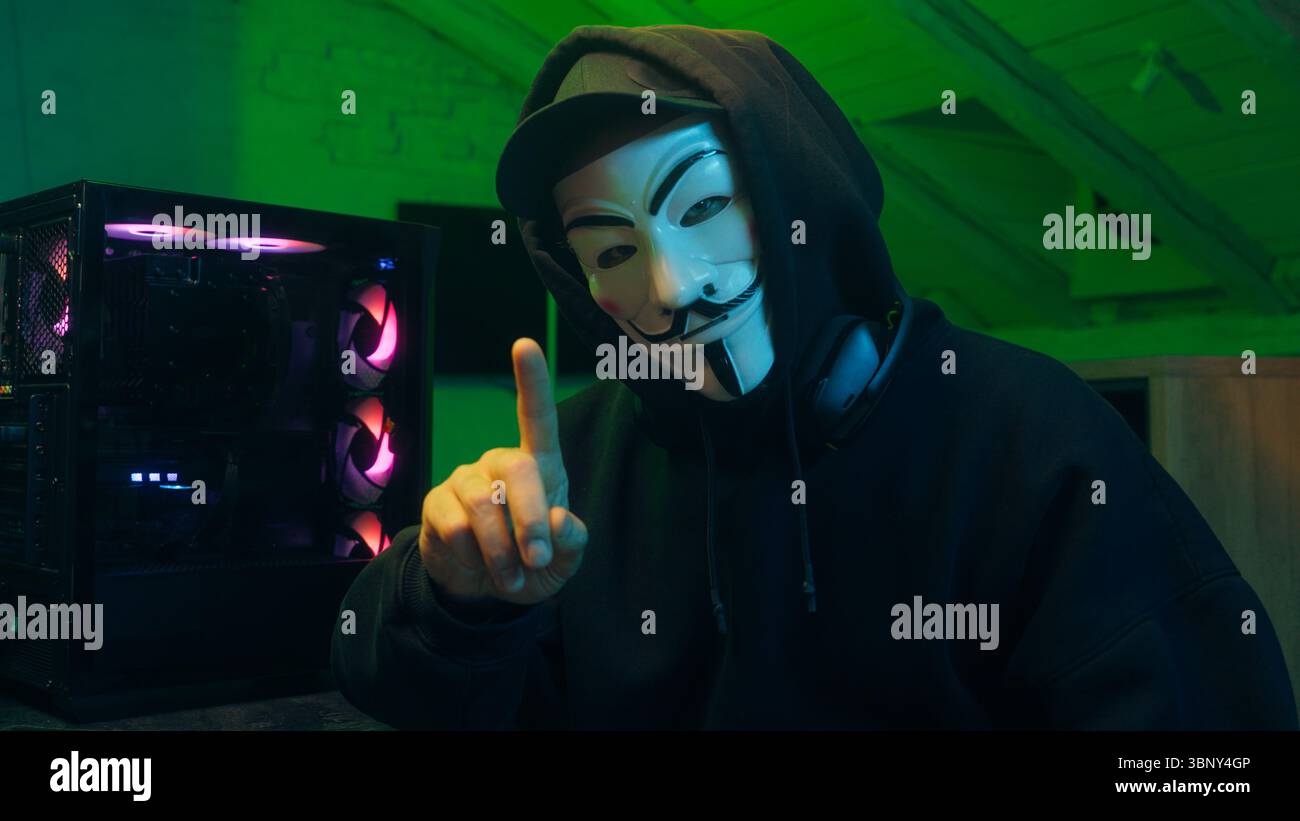 Lviv, Ukraine - June 03, 2024: Anonymous hacker smartphone monitor ...