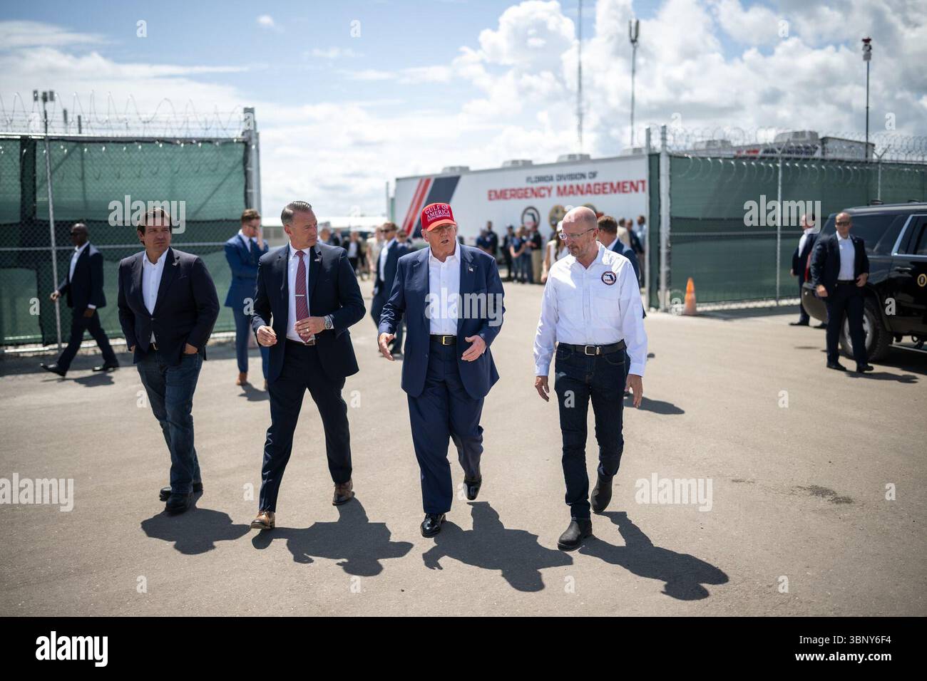 President Donald Trump, Ron Desantis, and other officials take a ...