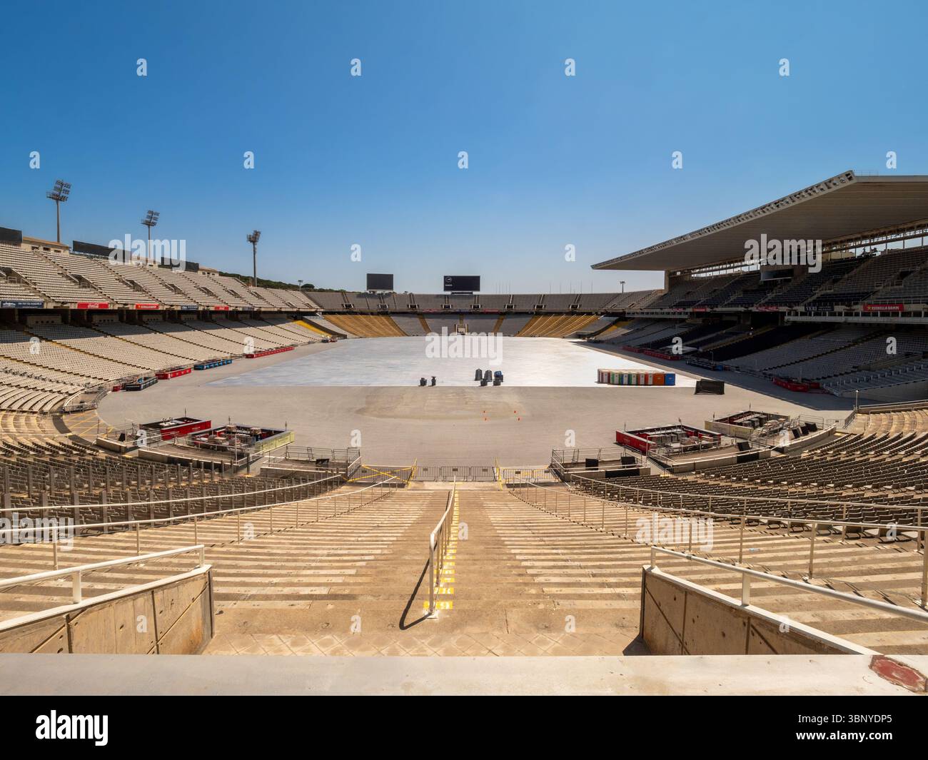 The empty seats and covered field of the Estadi Olímpic Lluís Companys ...