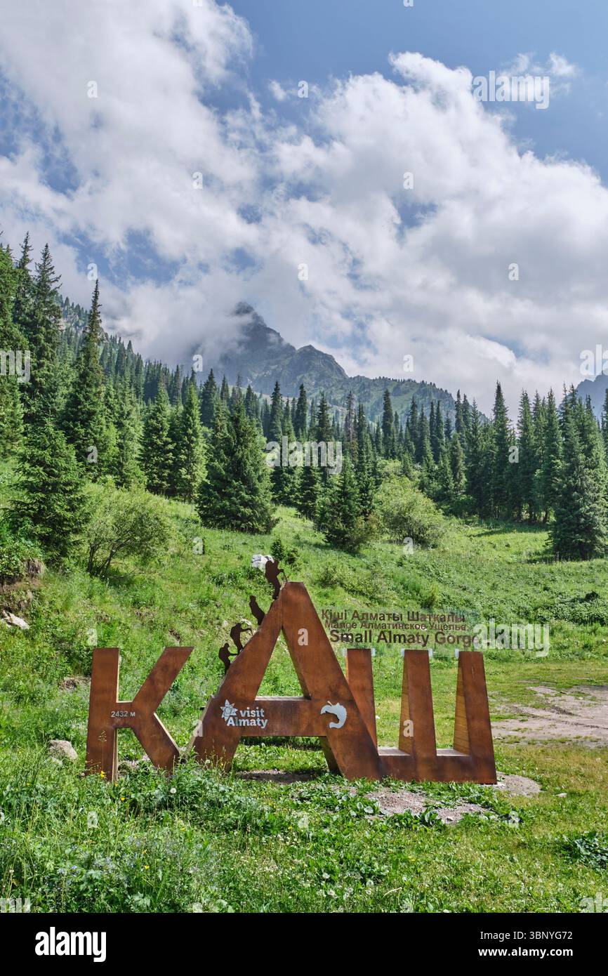 Kazakhstan, Almaty - June 27, 2025: Scenic view of a wooden sign ...