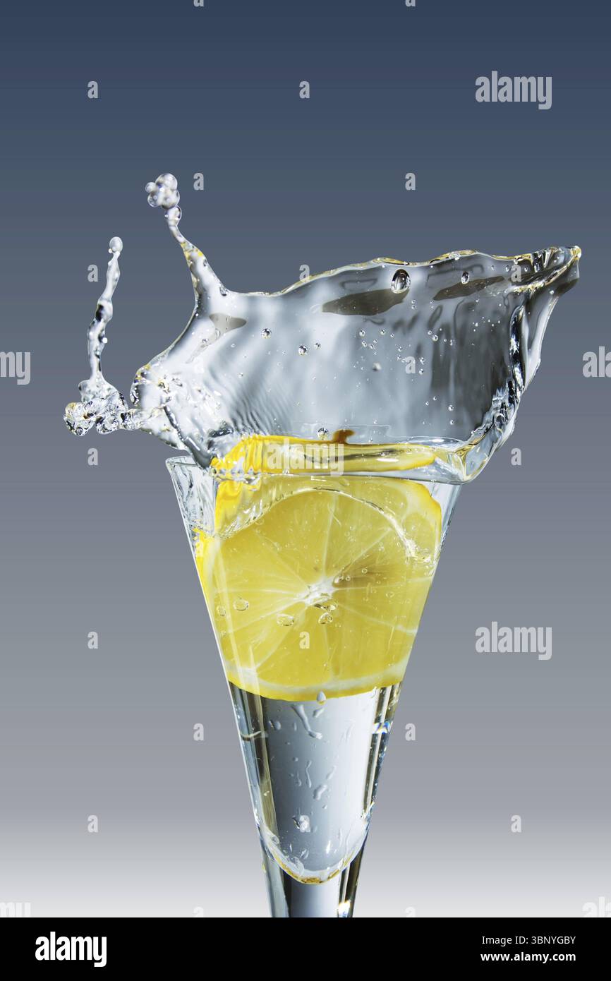Slice of lemon drops in a glass Stock Photo - Alamy