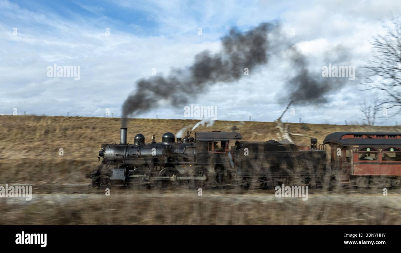 Steam train puffs along tracks hi-res stock photography and images - Alamy