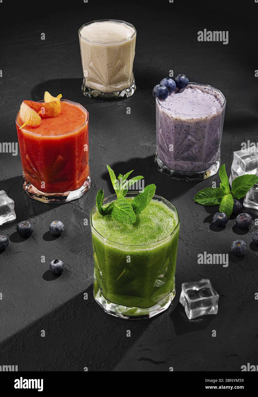 food still-life, Freshly blended fruit smoothies of various colors and ...