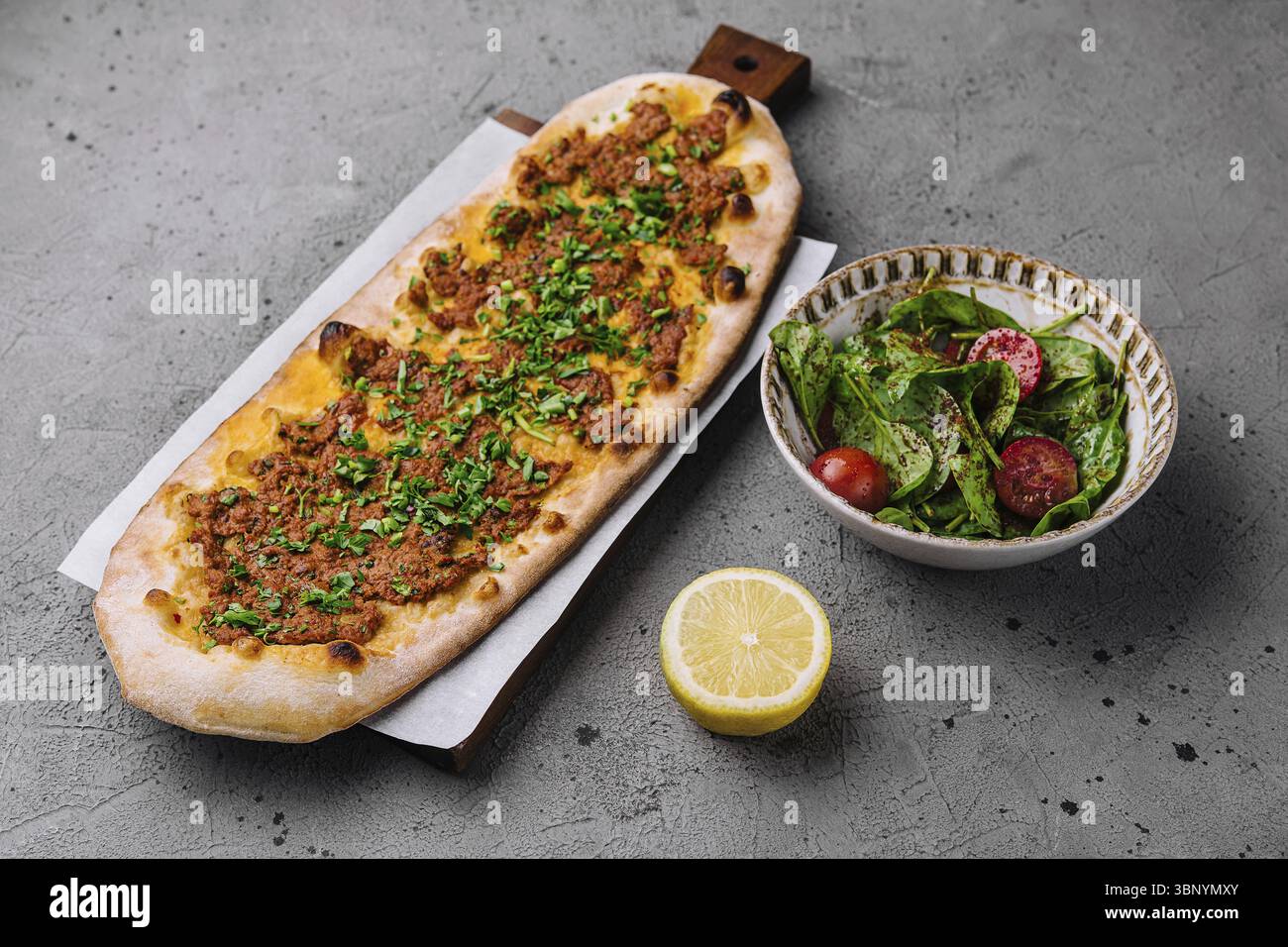 food still-life, Pide is a Turkish flatbread stuffed with minced lamb ...