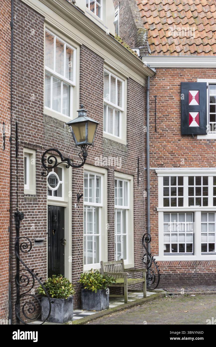 Traditional dutch village house in the streets of Enkhuizen, touristic ...