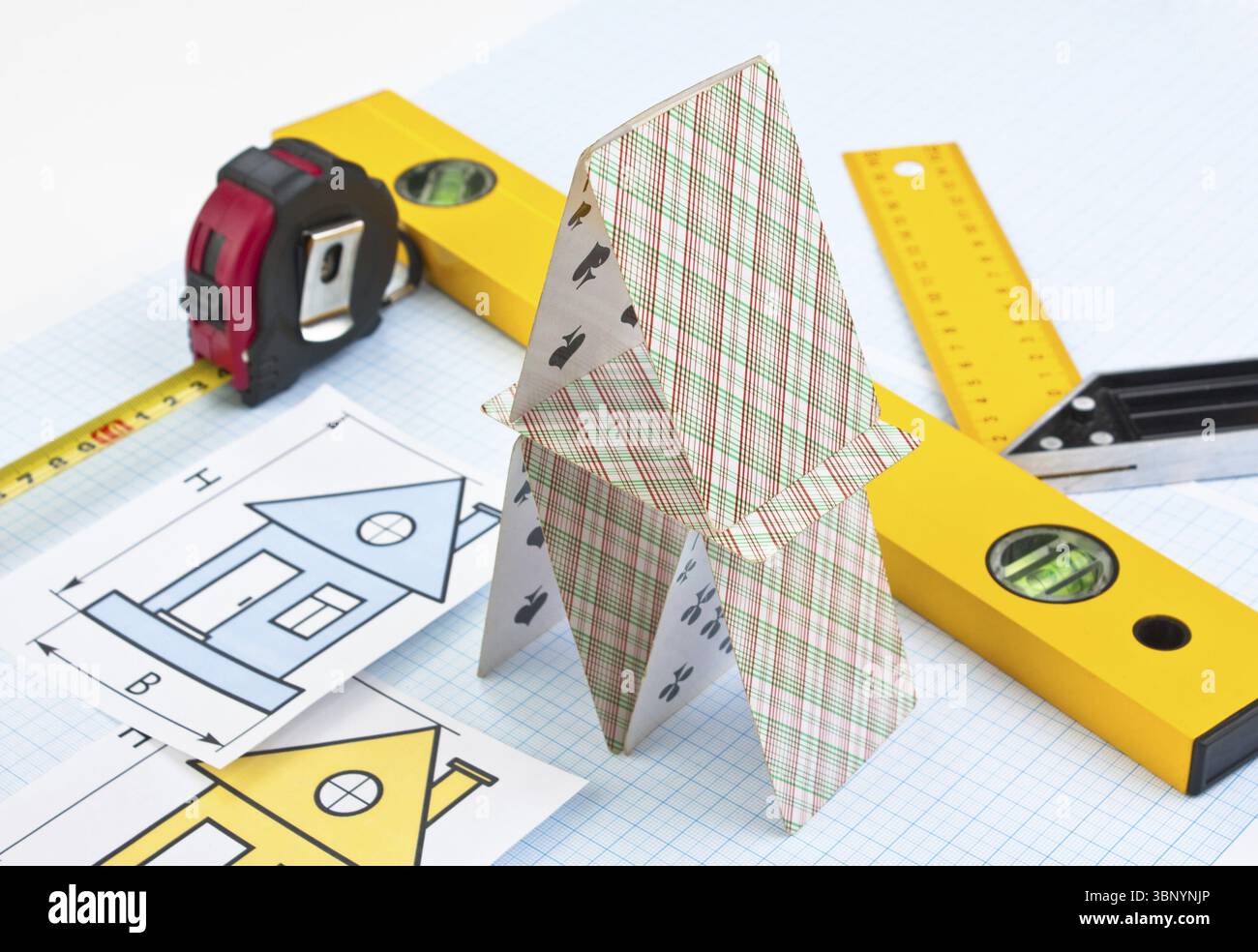 Layout of the house and tools on graph paper Stock Photo - Alamy