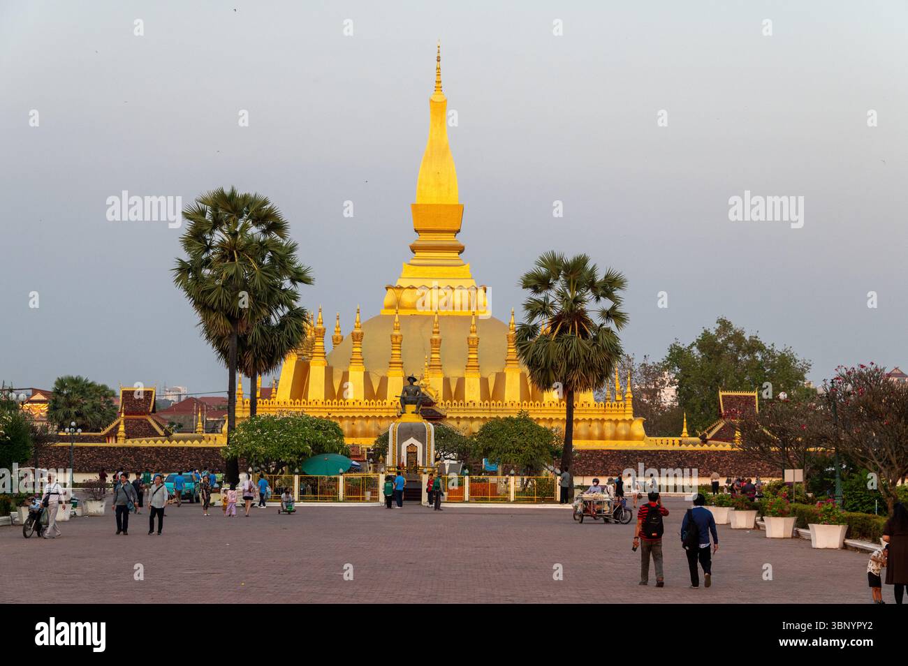 The famous skyline of the Pha That Luang Stupa. It is covered in gold ...
