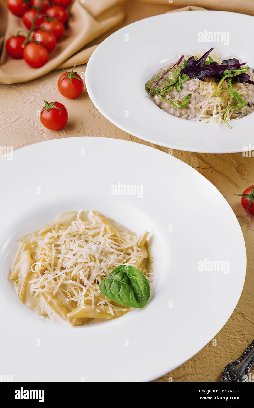 food still-life, Penne pasta with parmesan and rice with parmesan Stock ...