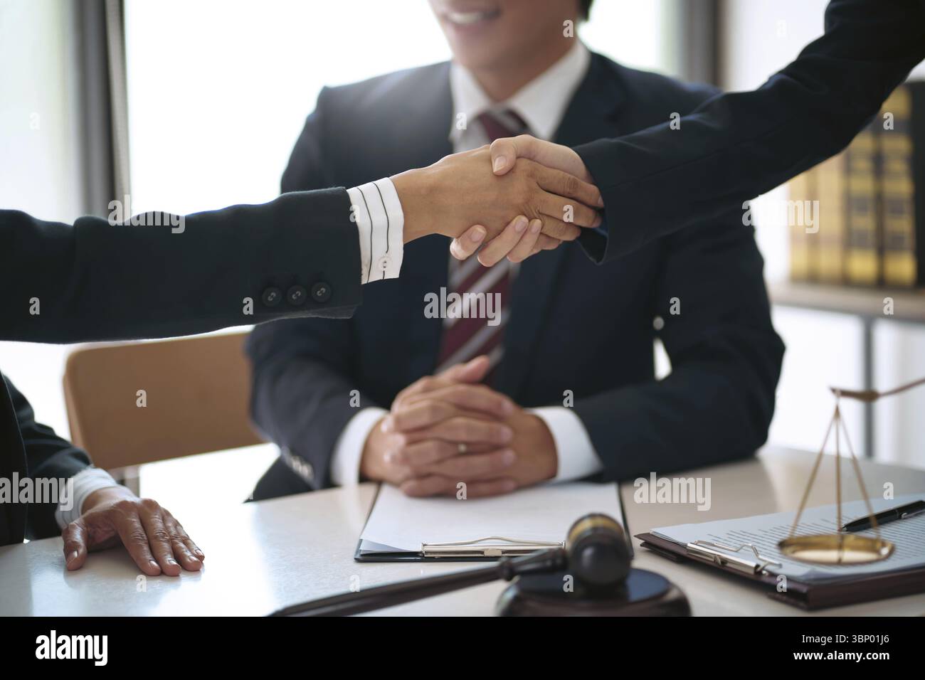 Lawyer consultant shaking hand with client sign contract agreement ...