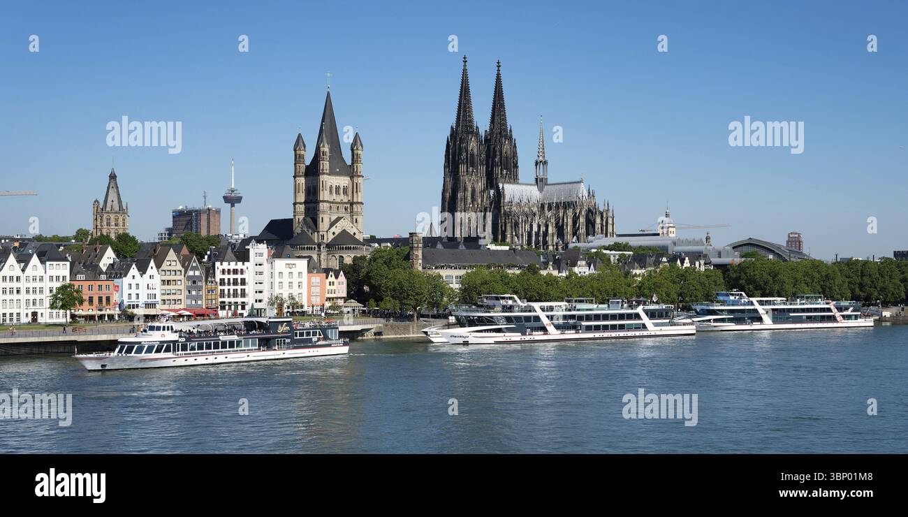 Cologne, Germany June 25 2024: many large excursion boats on the banks ...