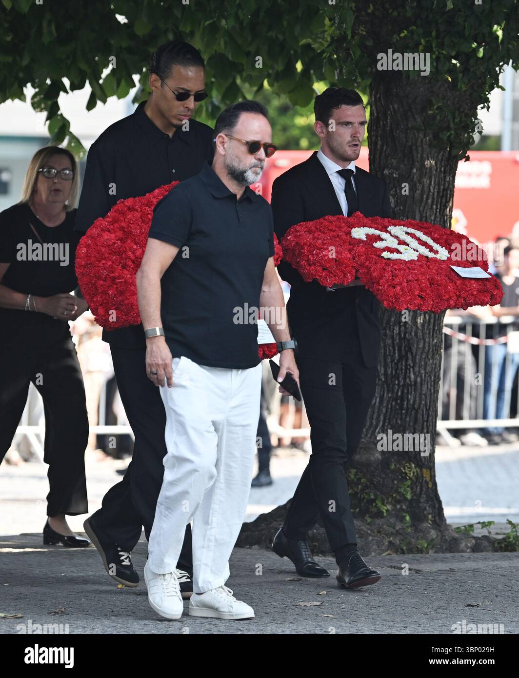 Liverpool's Virgil Van Dijk and Andy Robertson arrive at the funeral of ...
