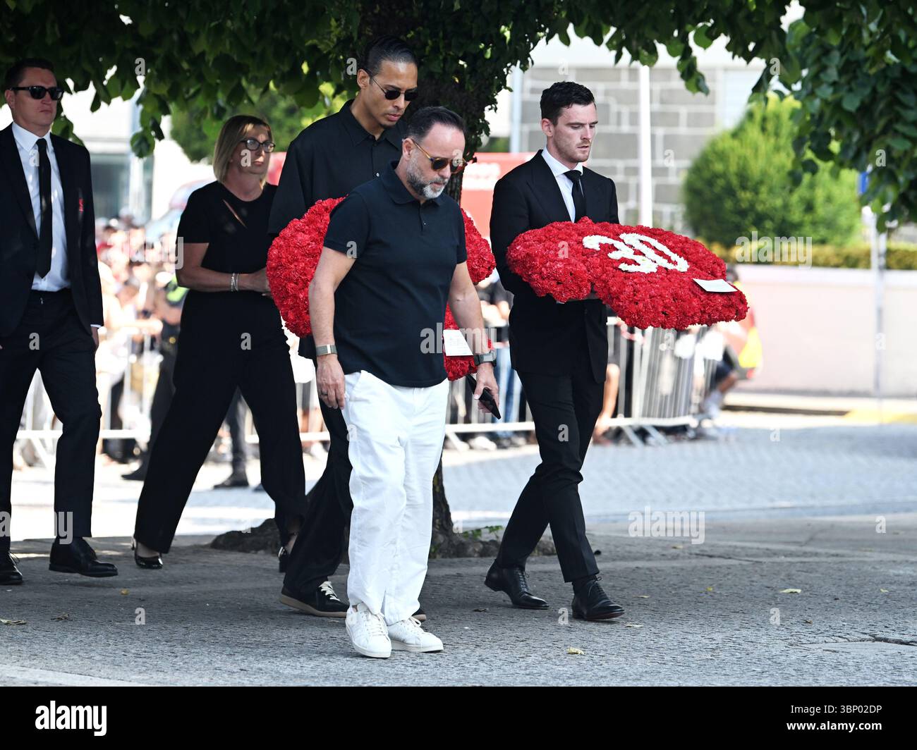 Liverpool's Virgil Van Dijk and Andy Robertson arrive at the funeral of ...