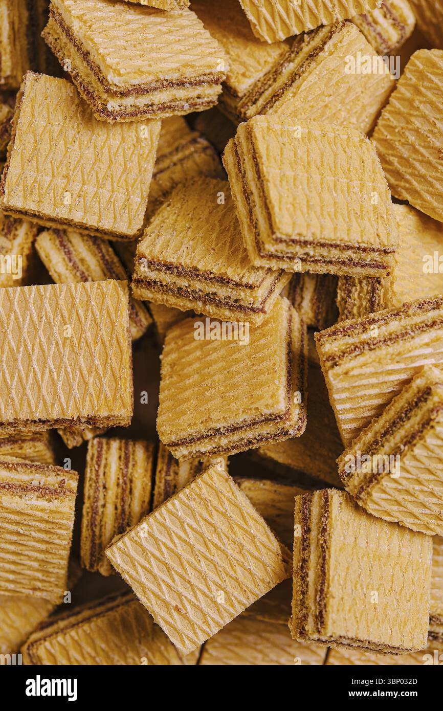 food still-life, Small squares of crispy wafers display intricate ...