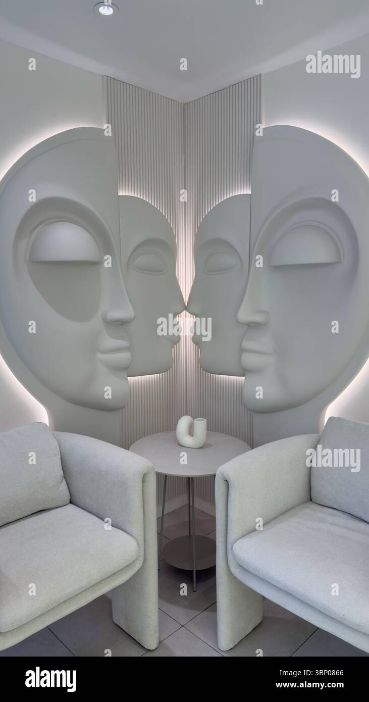 Contemporary Art Installation Featuring Sculpted Faces in a Minimalist ...