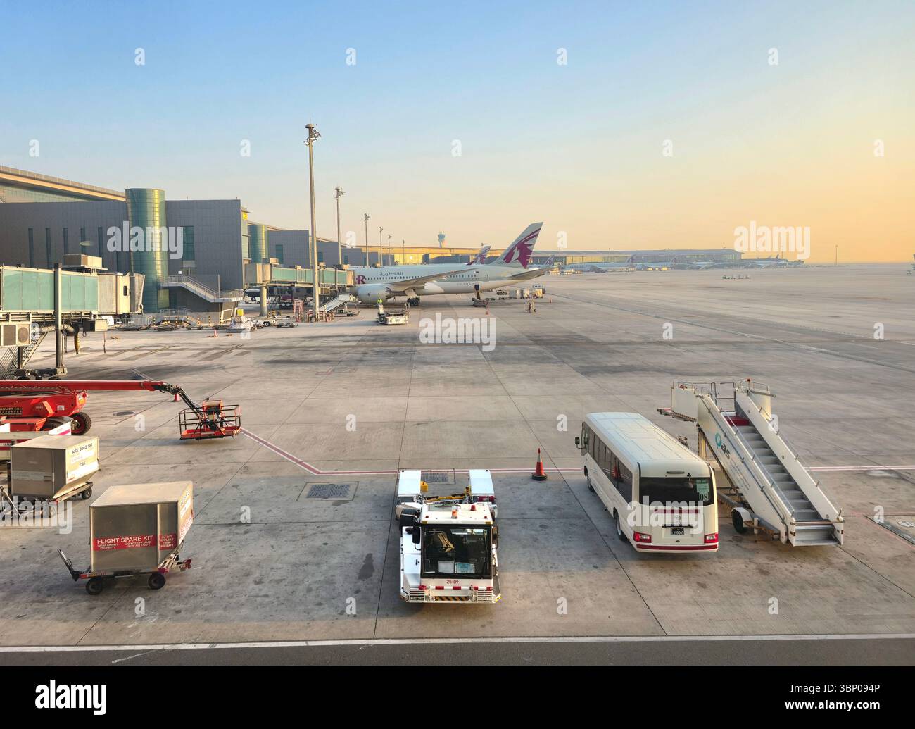 A Qatar Airways plane at the gate at Hamad international airport in ...