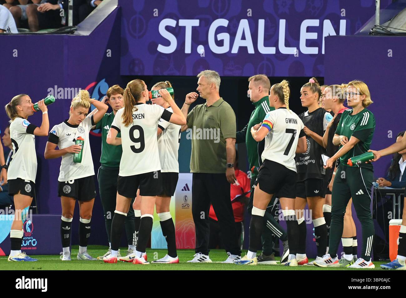 German national coach Christian WUECK (GER) with players during a drink ...