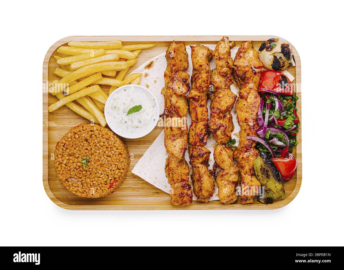 Dish features grilled chicken Cut Out Stock Images & Pictures - Alamy
