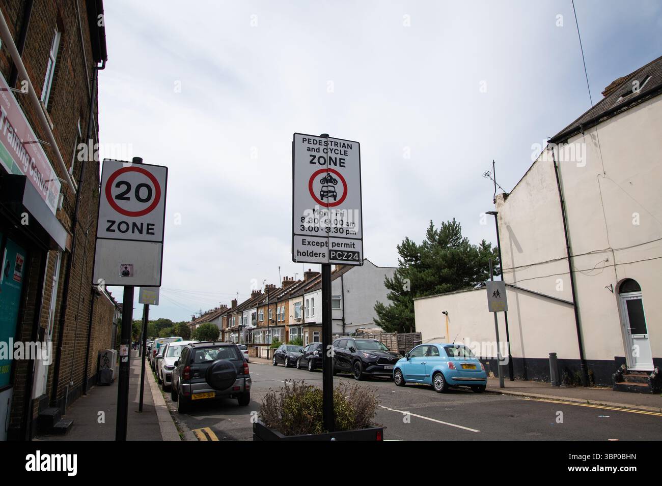Street sign indicating a pedestrian and cycle zone with restricted access for motor vehicles at ...