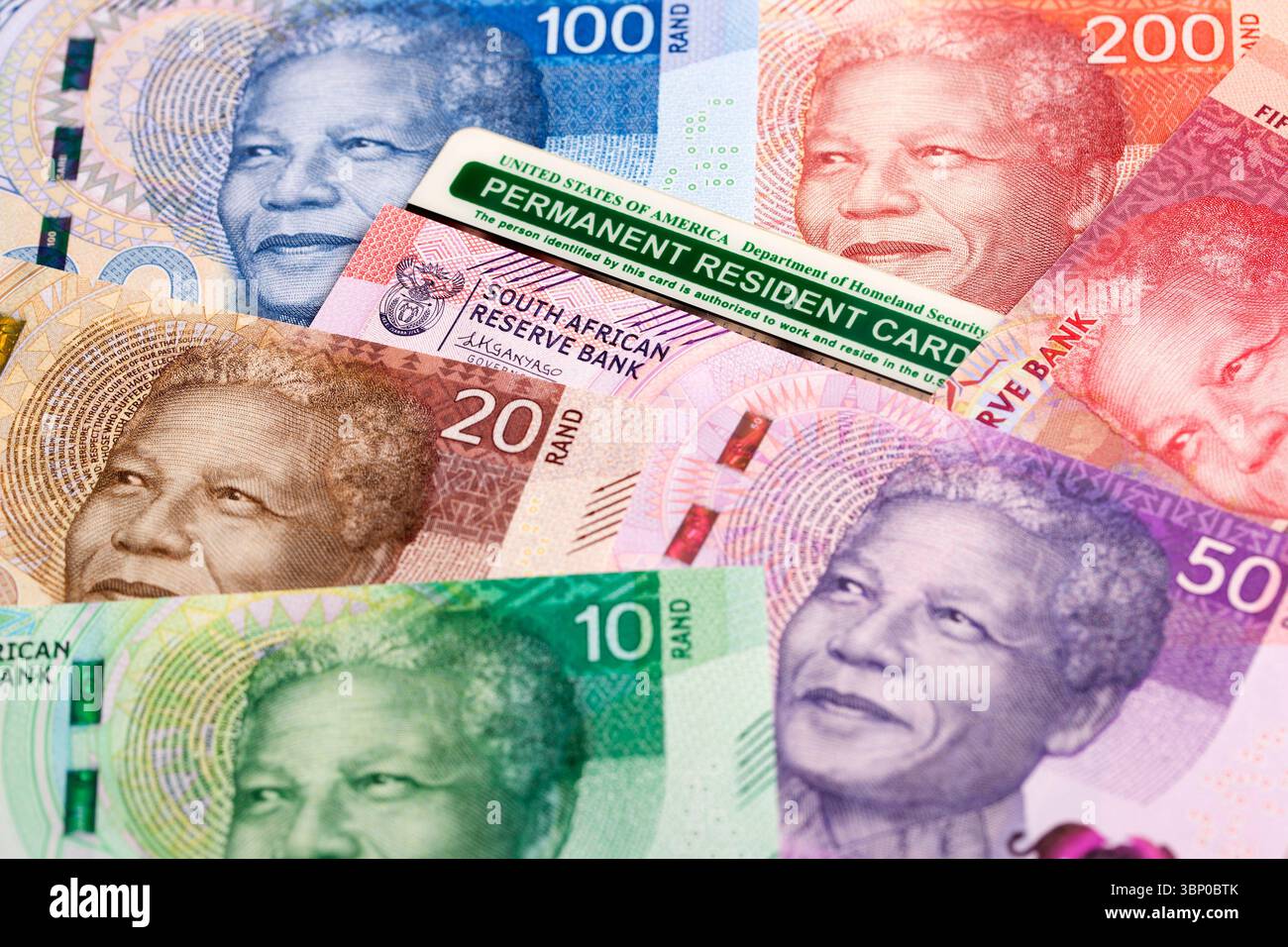 American permanent resident card on South African money - Rand Stock ...