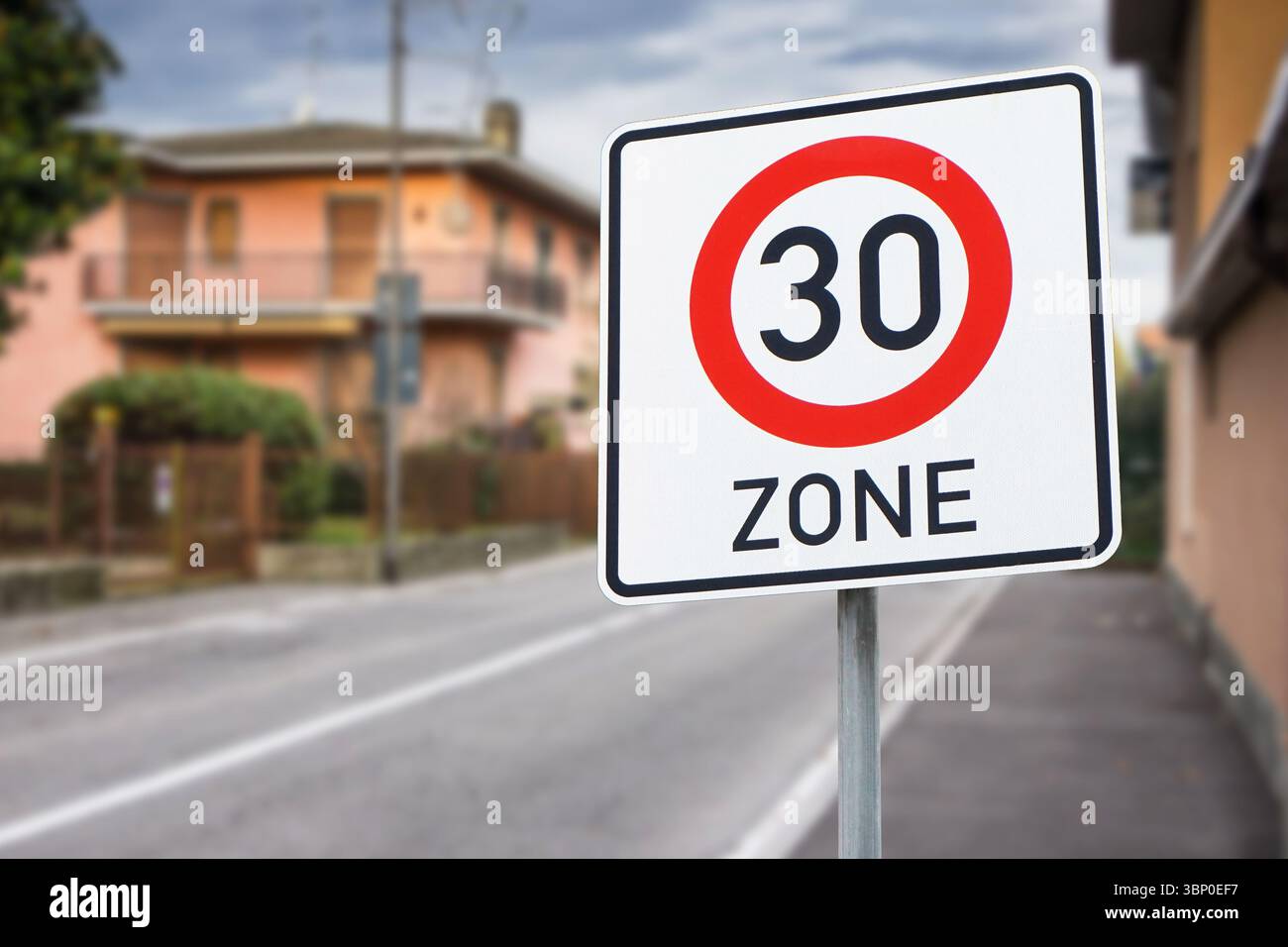 Speed limit sign zone 30. German street safety sign near residential ...