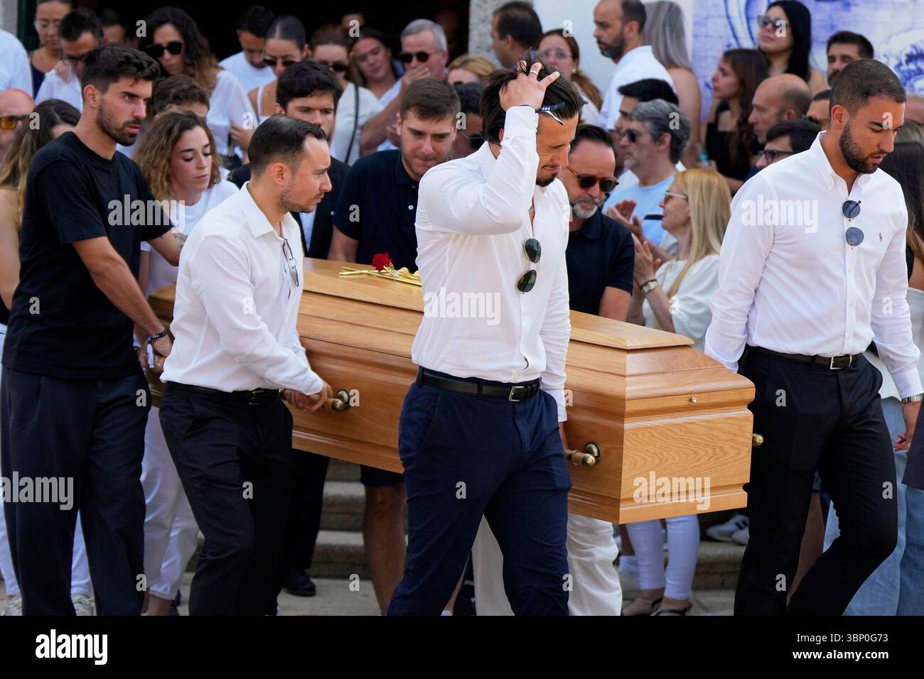Diogo Jota's wife Rute Cardoso reacts next to the coffin of his husband ...