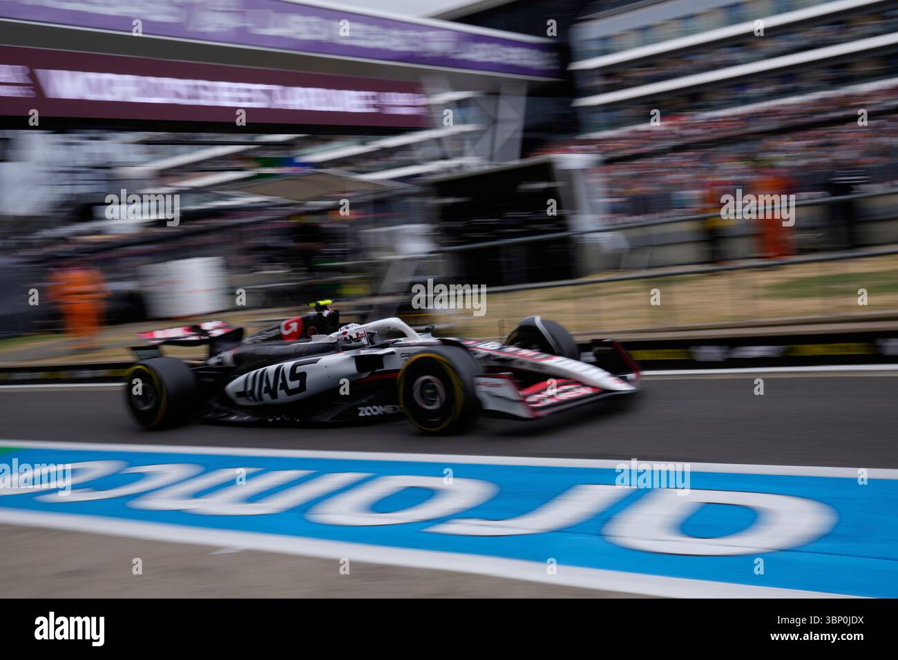 Haas driver Esteban Ocon of France exits the pit lane during the third ...