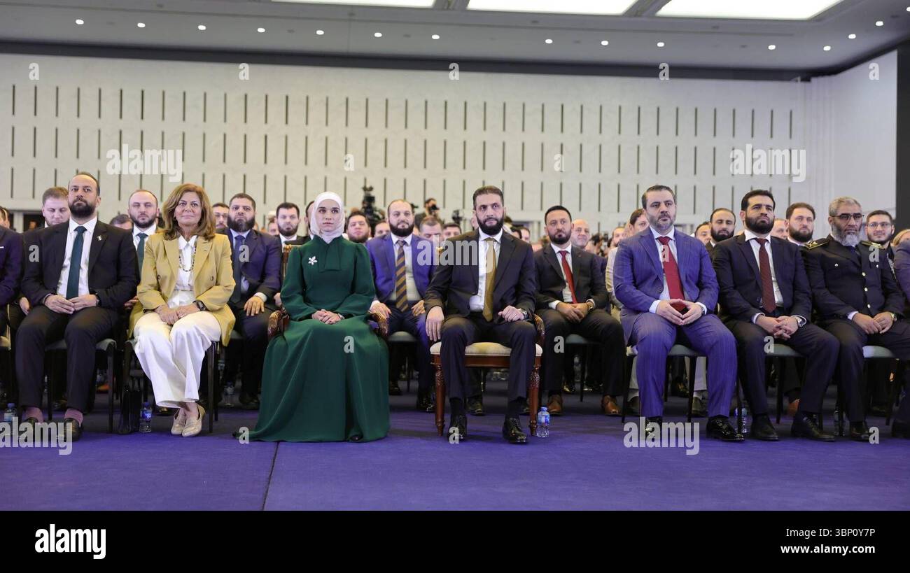 Syrian President Ahmad Al-Sharaa attends the launch ceremony of the new ...