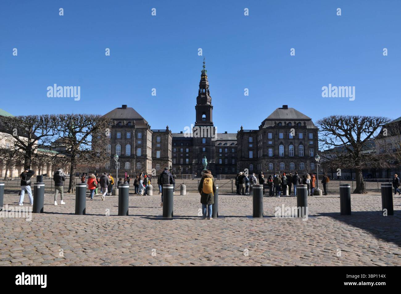 Copenhagen /Denmark/02 April 2023/ Tourists enjoy sun shine palme ...