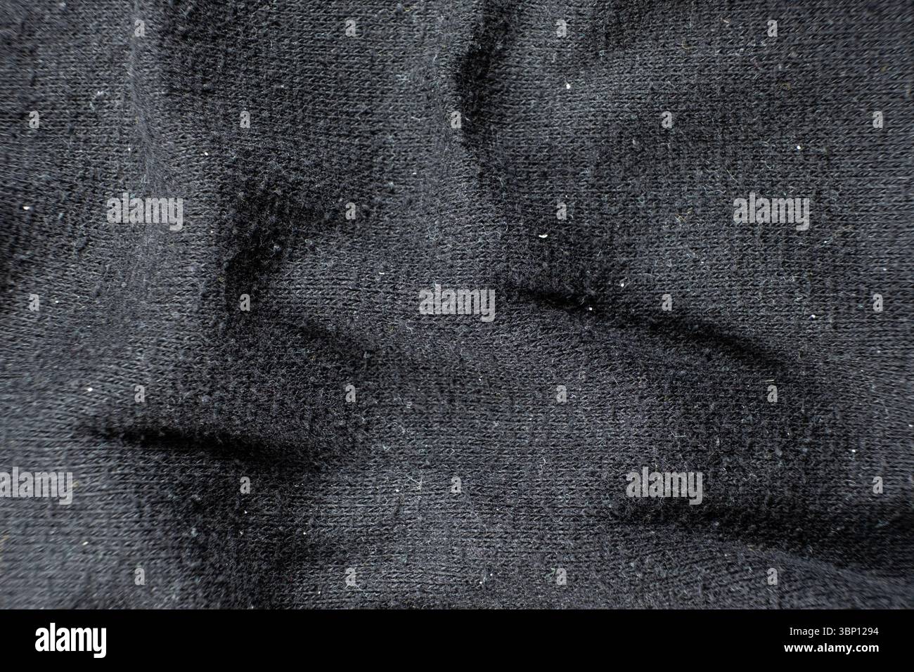 Old worn-out fabric with damaged structure, protruding threads Stock ...