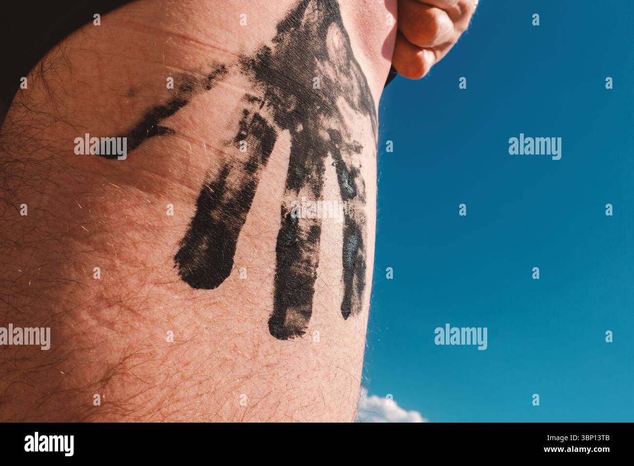 Handprint on Skin Against a Bright Blue Sky Depicting the Theme of ...