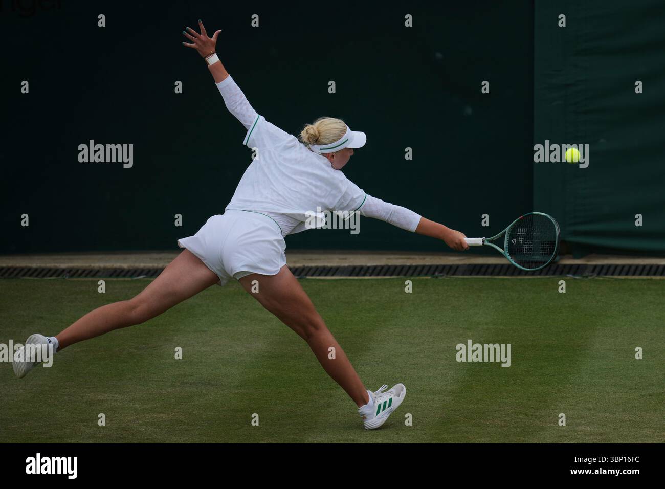 Clara Tauson of Denmark plays a return to during their women's singles ...