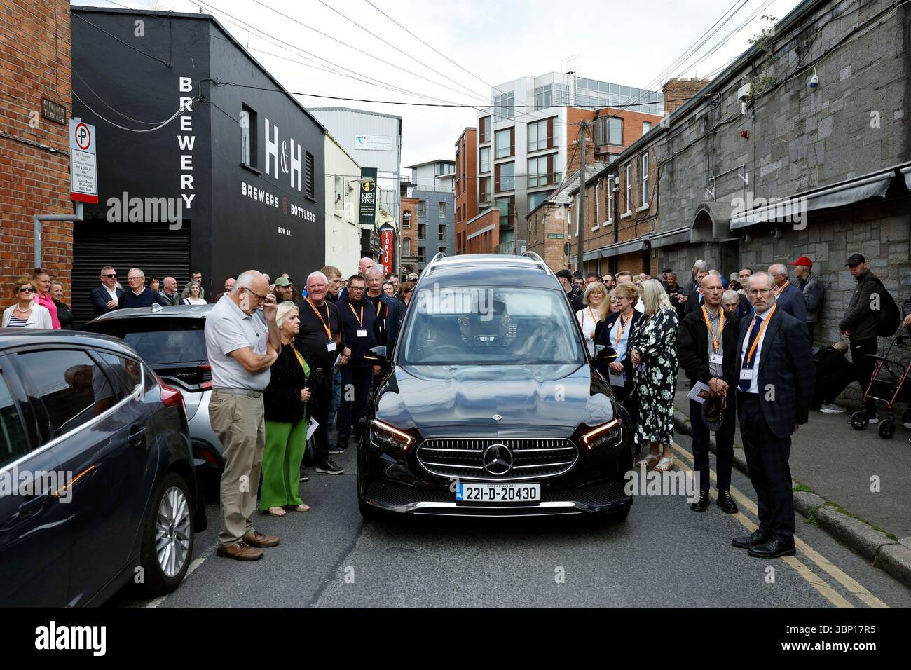 The hearse carrying the remains of Brother Kevin Crowley passes the ...
