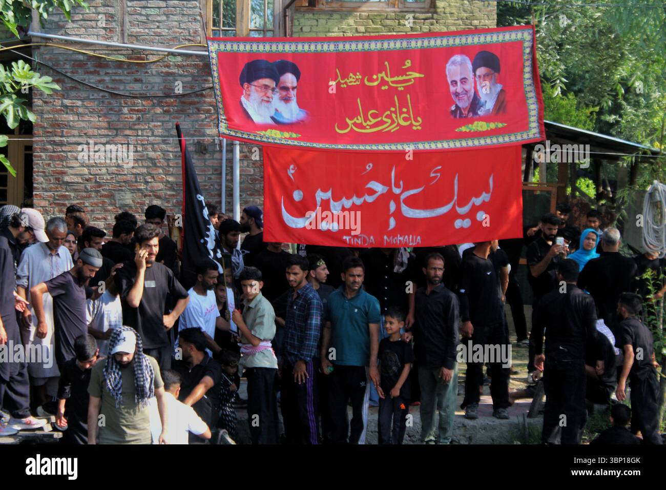 Kashmiri Shiite Muslims participate in a ninth Muharram procession ...