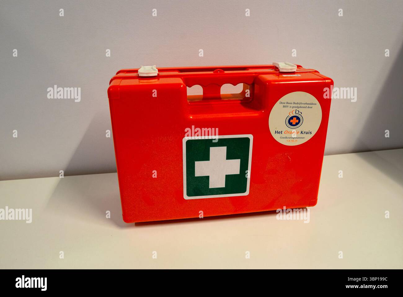 Orange coloured first aid kit Stock Photo - Alamy