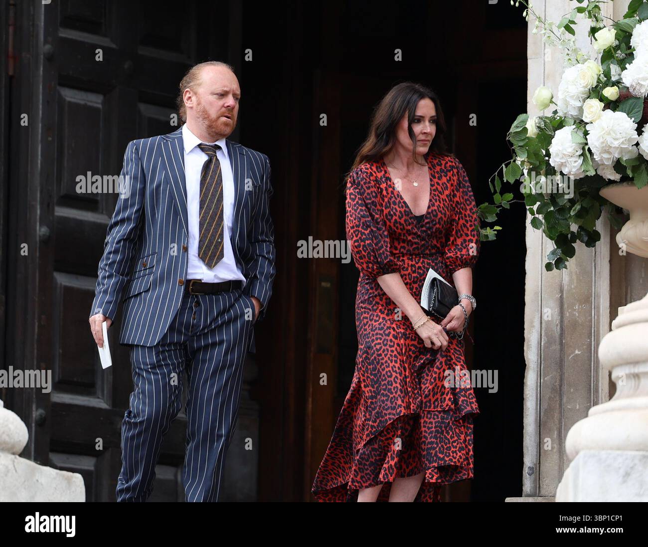 Leigh Francis and wife Jill Carter leave following the wedding of Spice ...