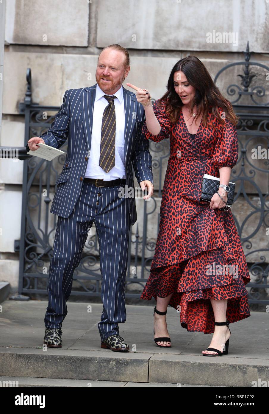 Leigh Francis and wife Jill Carter leave following the wedding of Spice ...