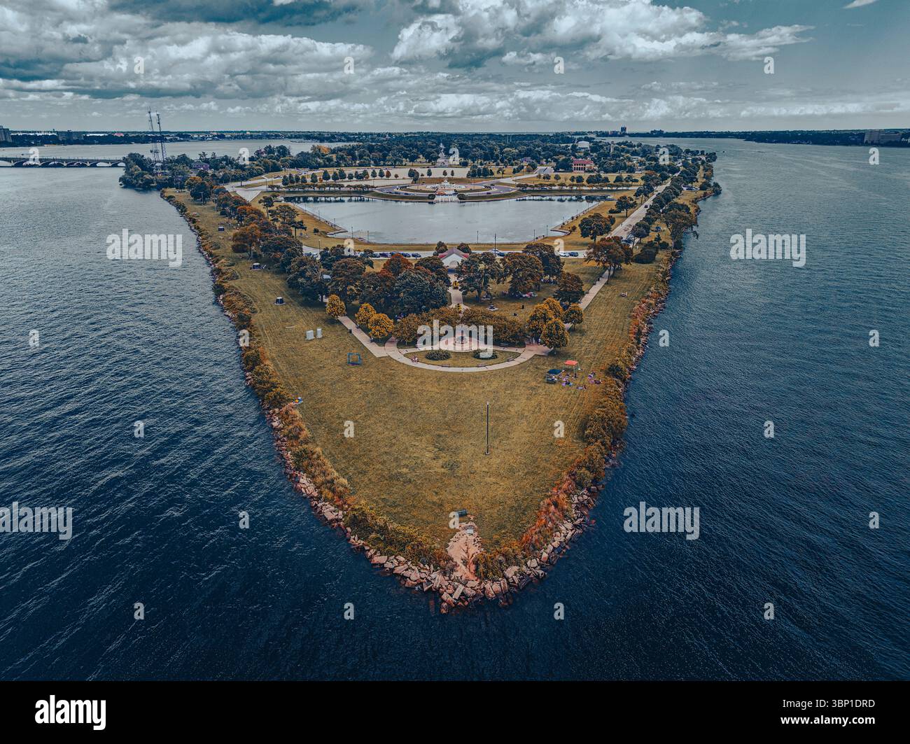 People enjoying a summer day picnic on Detroit's Belle Isle State Park ...