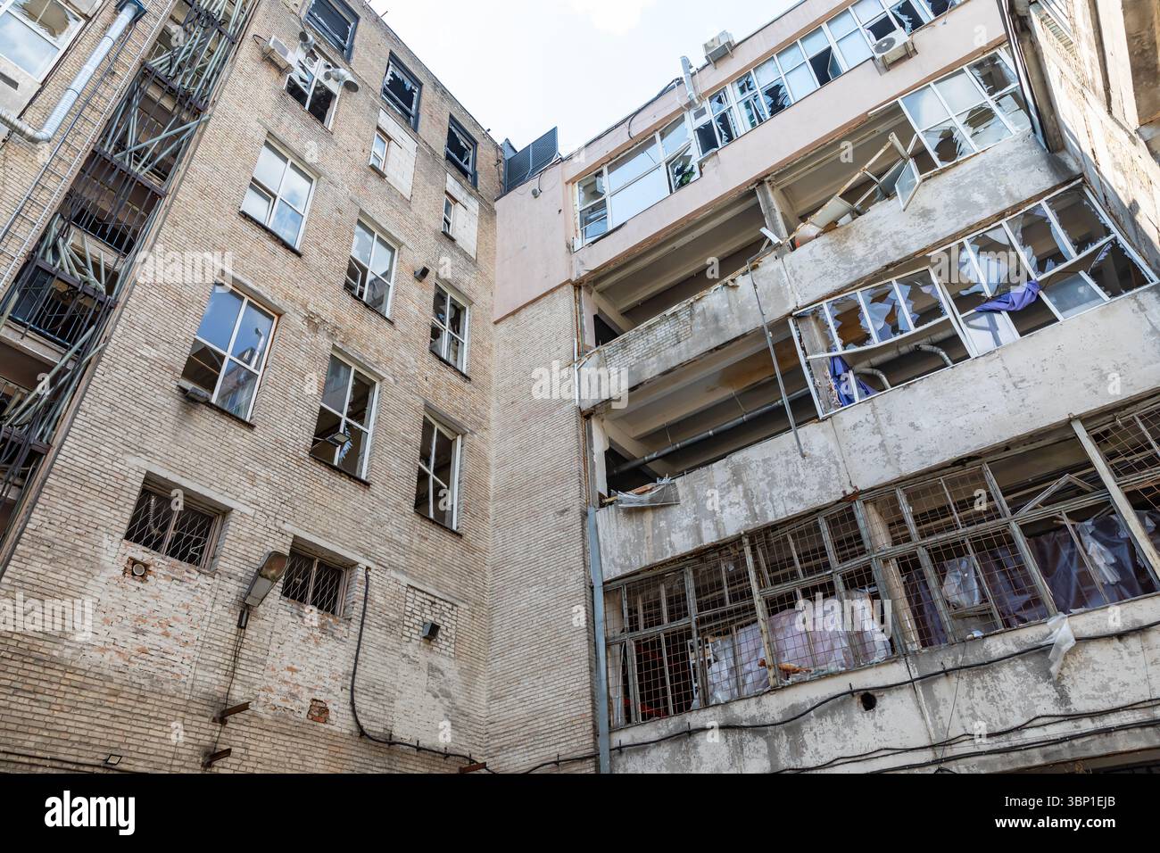 KYIV, UKRAINE - Jul. 04, 2025: damaged buildings with shattered windows ...